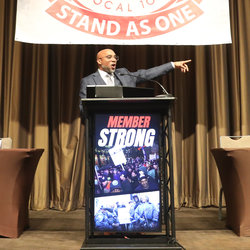 President Davis Presides Over Jam Packed Mass Membership Meeting Talks